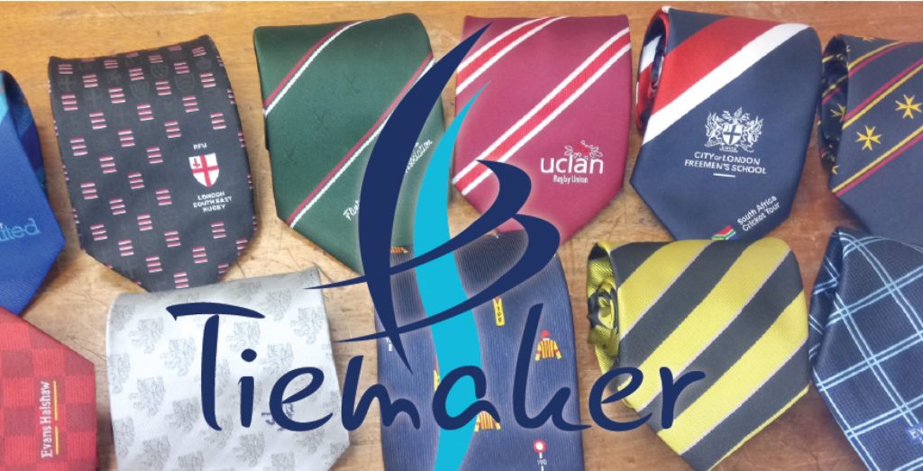 Tiemaker making custom ties scarves for companies clubs colleges